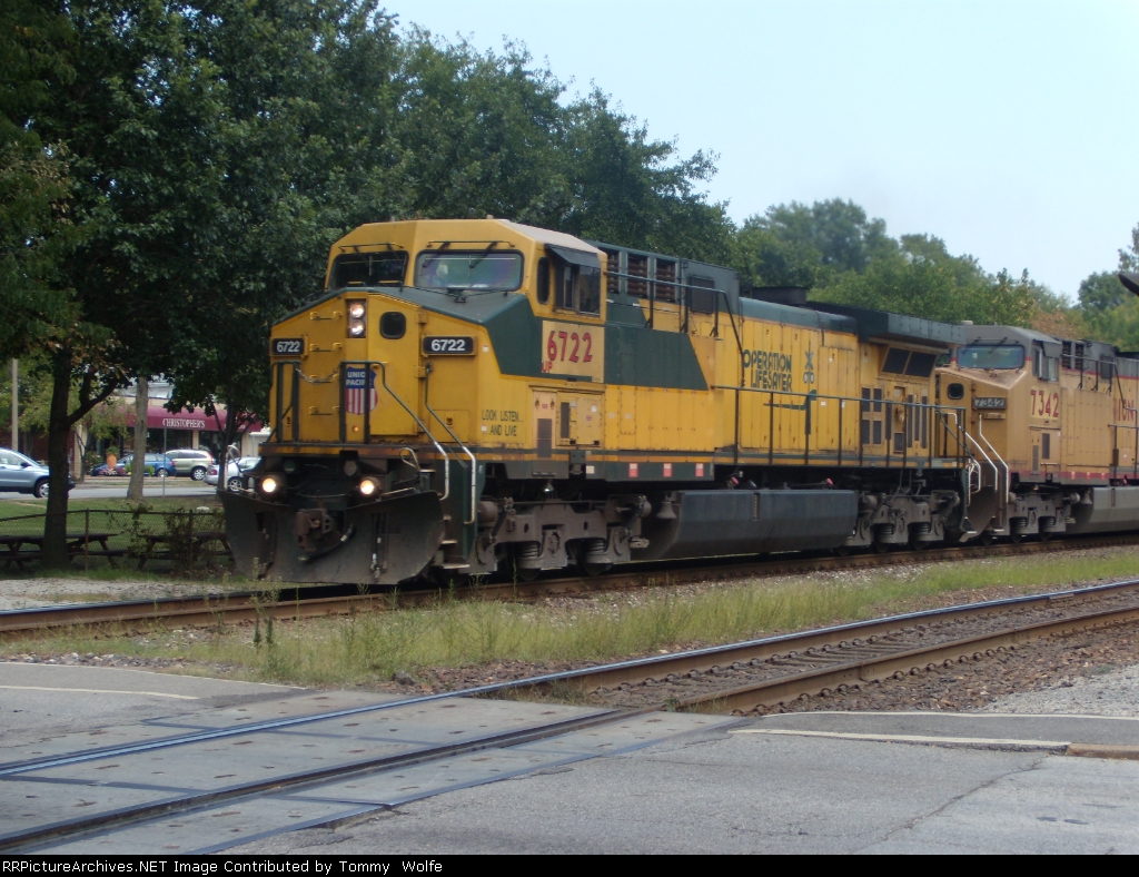 UP 6722 (old CNW AC44CW) leads empty coal westbound